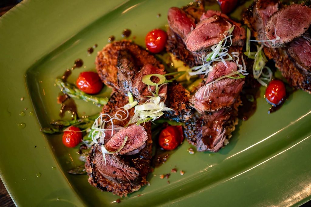 Bbq venison leg fillet with eggplant parmigiana grilled asparagus and ...